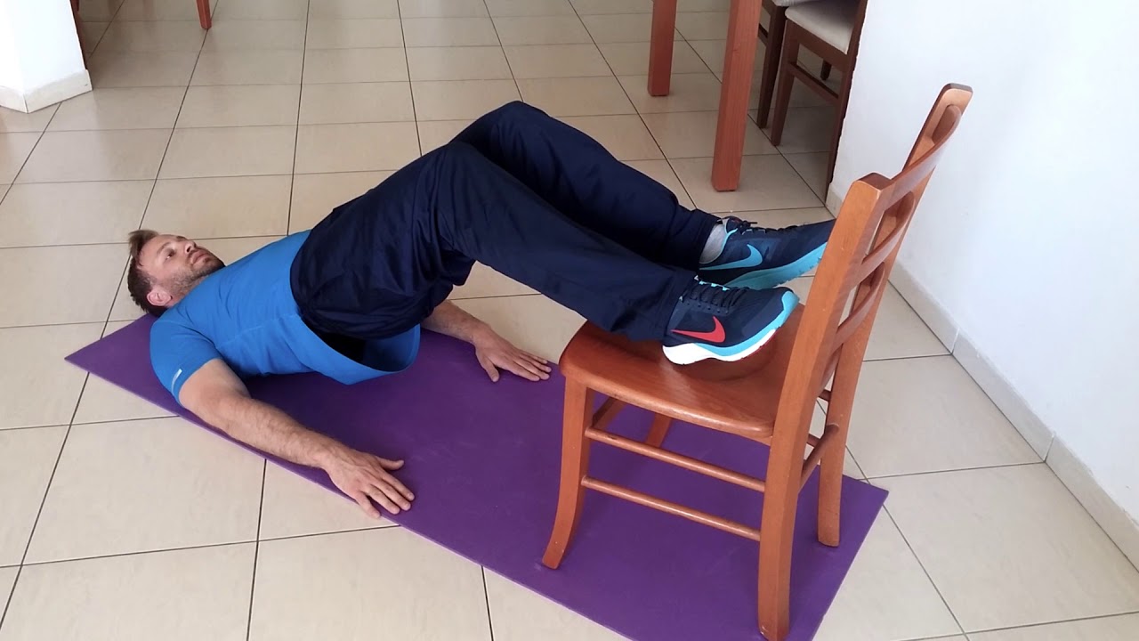 הרמת אגן רגליים על כסא – Hamstring Curl On Chair – WeFIT